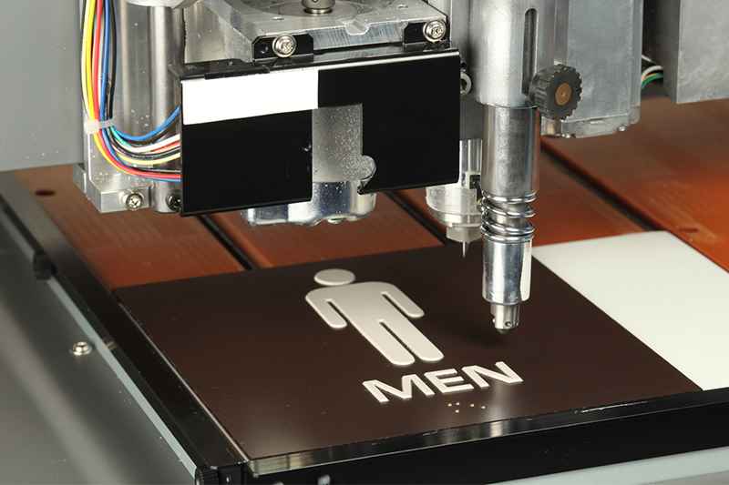 Printing braille and tactile signage