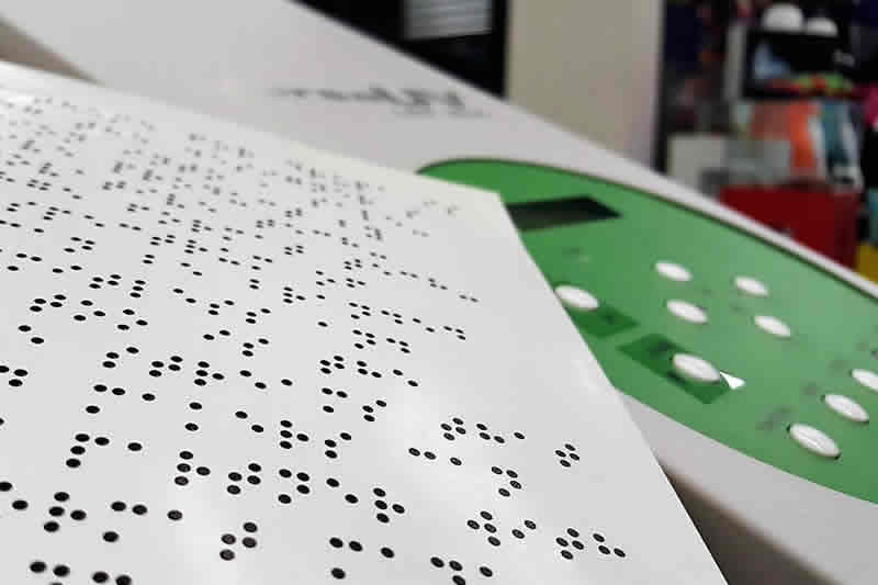 Printing braille and tactile signage